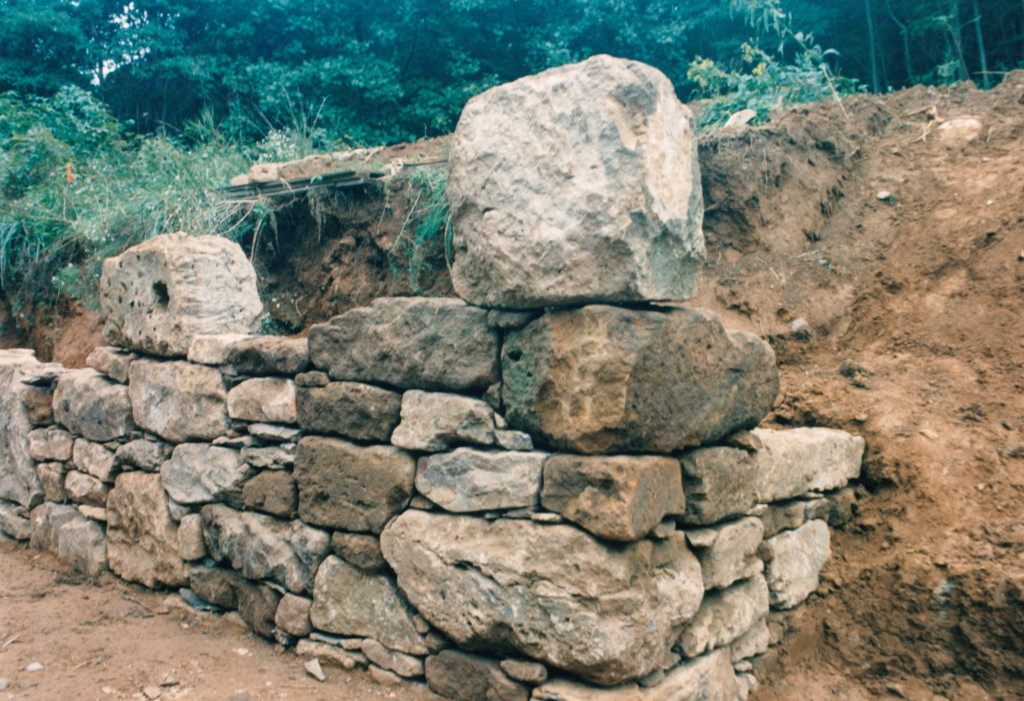 A stone retaining wall - Handmade Houses with Noah Bradley